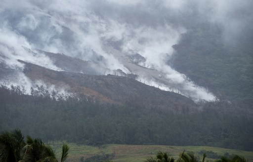 Fearless Philippine farmers defy volcano anger