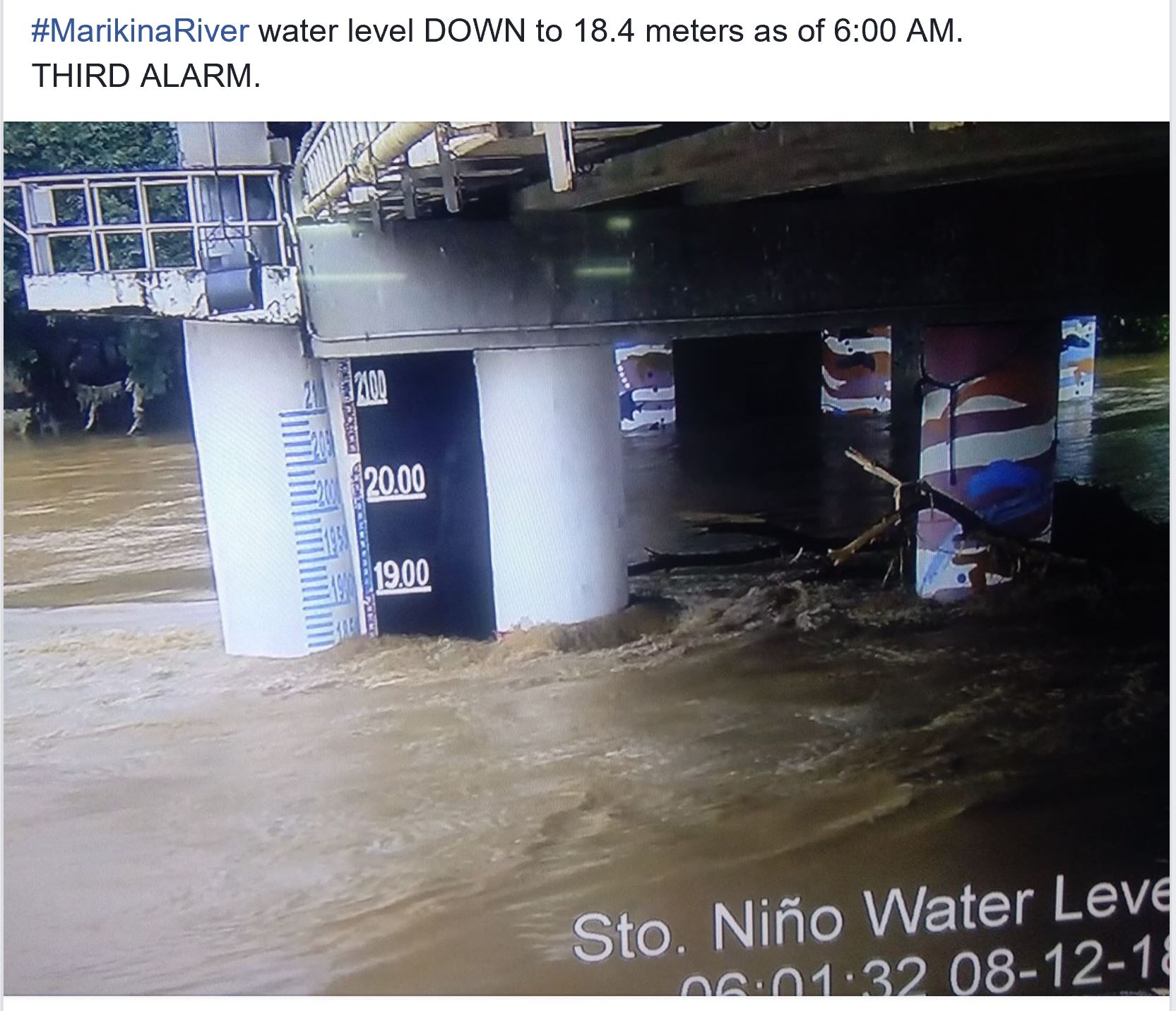 Marikina river's water level starts to go down; warning down to second ...