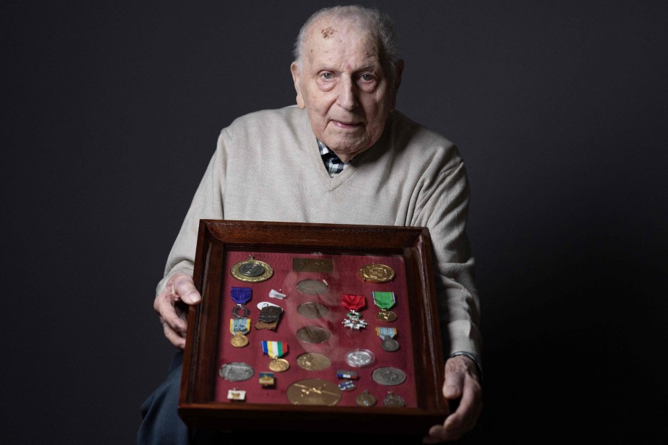 Coste 'proud' to carry Olympic torch 76 years after winning gold